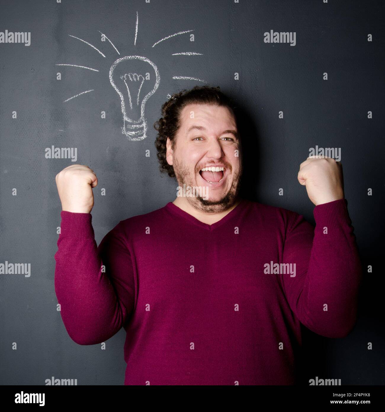 Idea and success. Yes. Man rejoices Stock Photo - Alamy