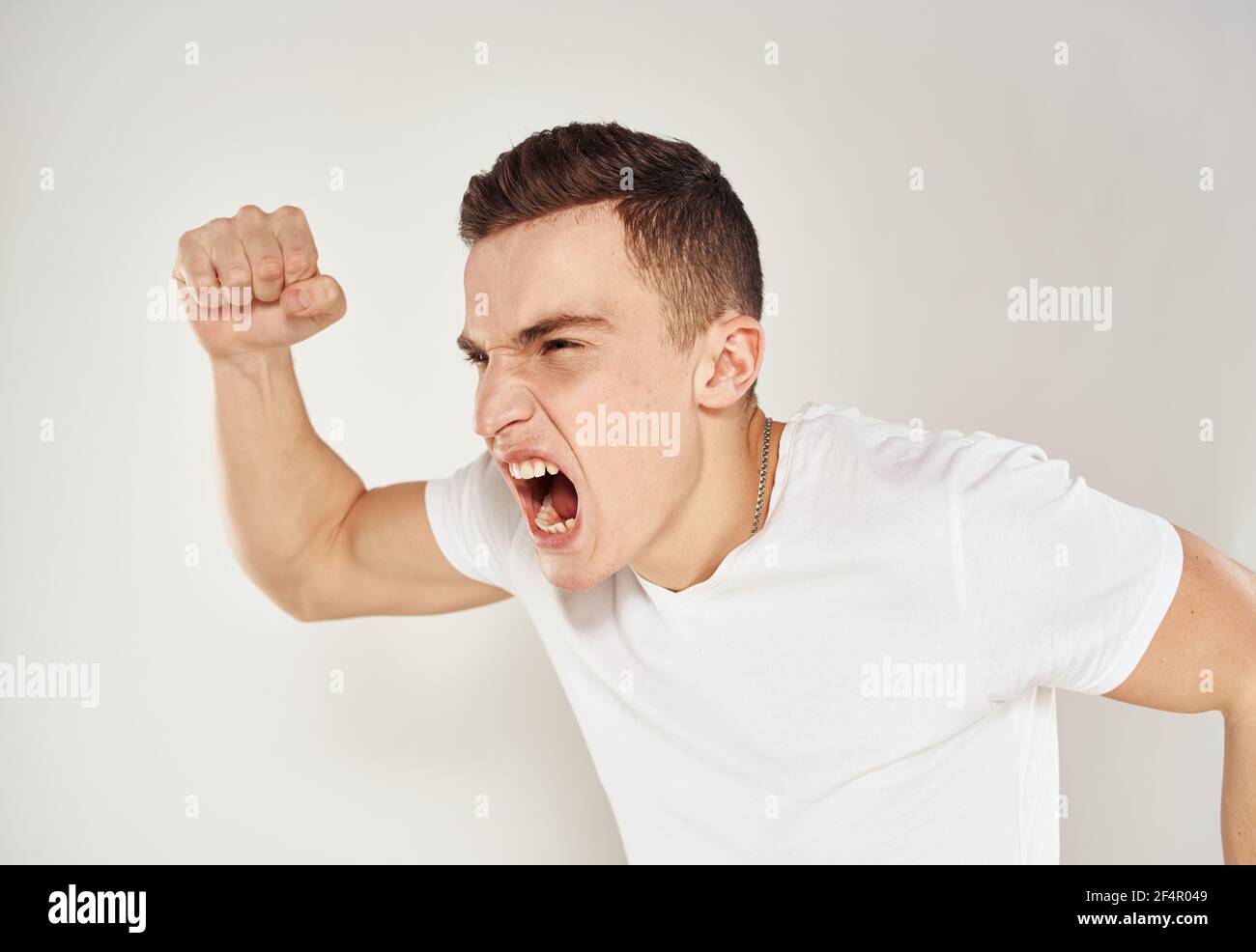 Emotions man irritability wide open mouth grin model cropped view Stock ...
