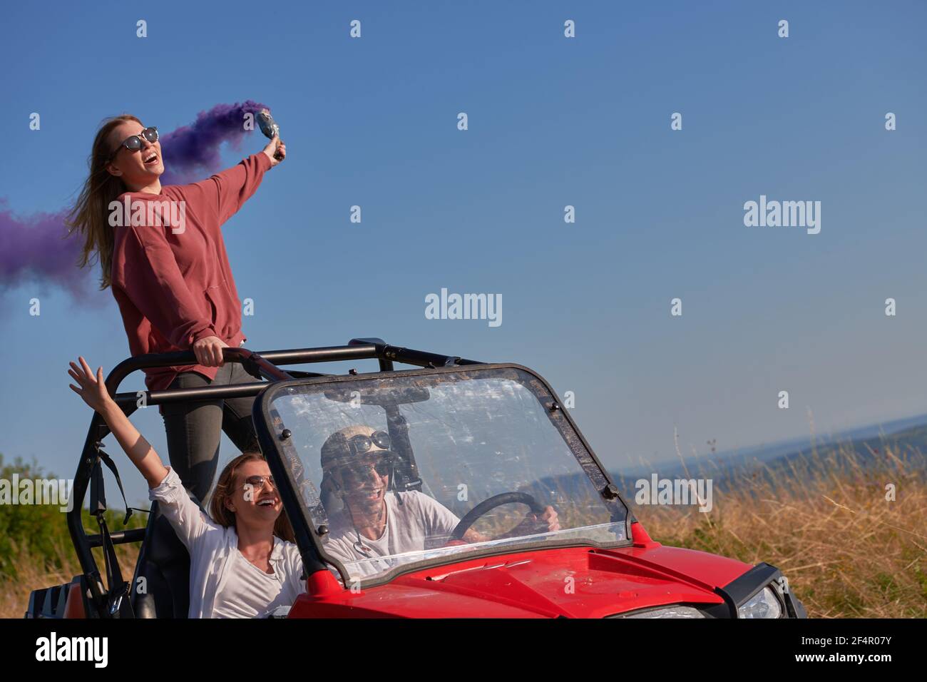 colorful torches while driving a off road buggy car Stock Photo - Alamy