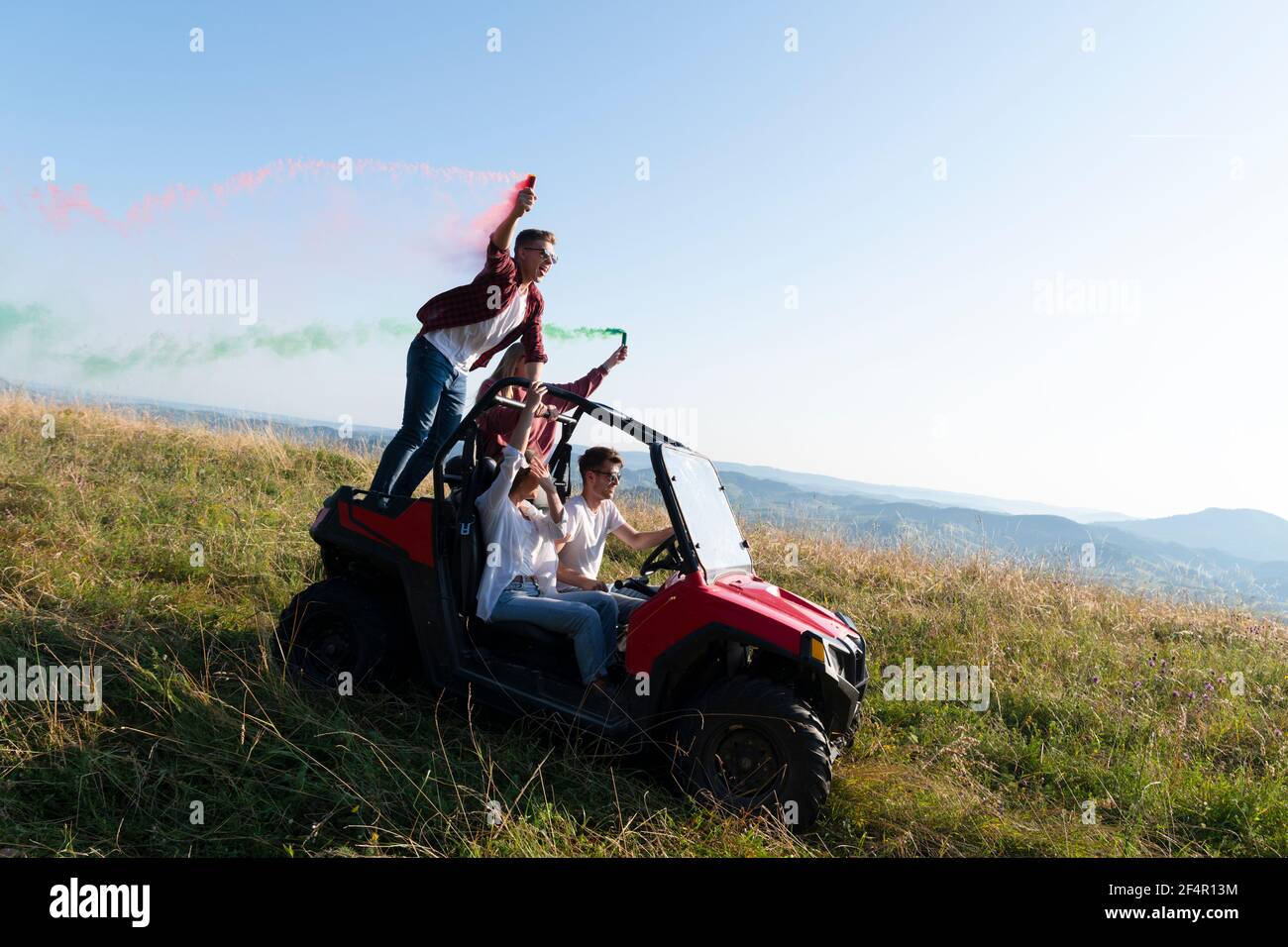 colorful torches while driving a off road buggy car Stock Photo - Alamy