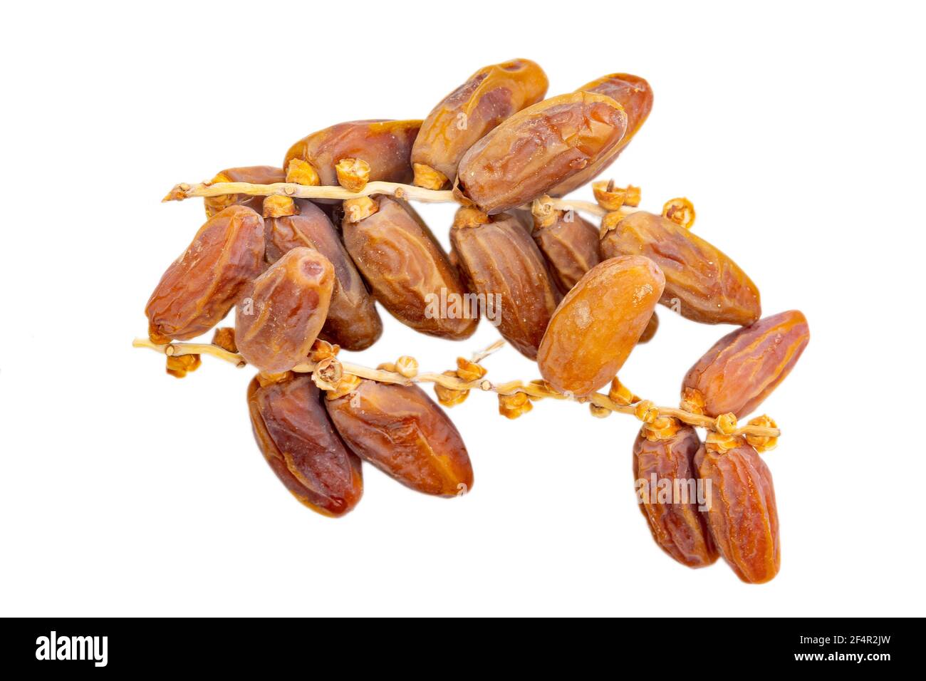 dried dates isolated on white background Stock Photo - Alamy