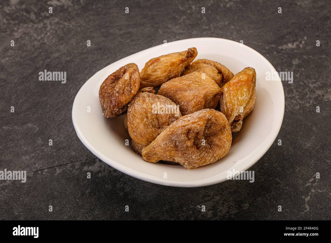 Dry sweet fig fruit heap snack Stock Photo - Alamy