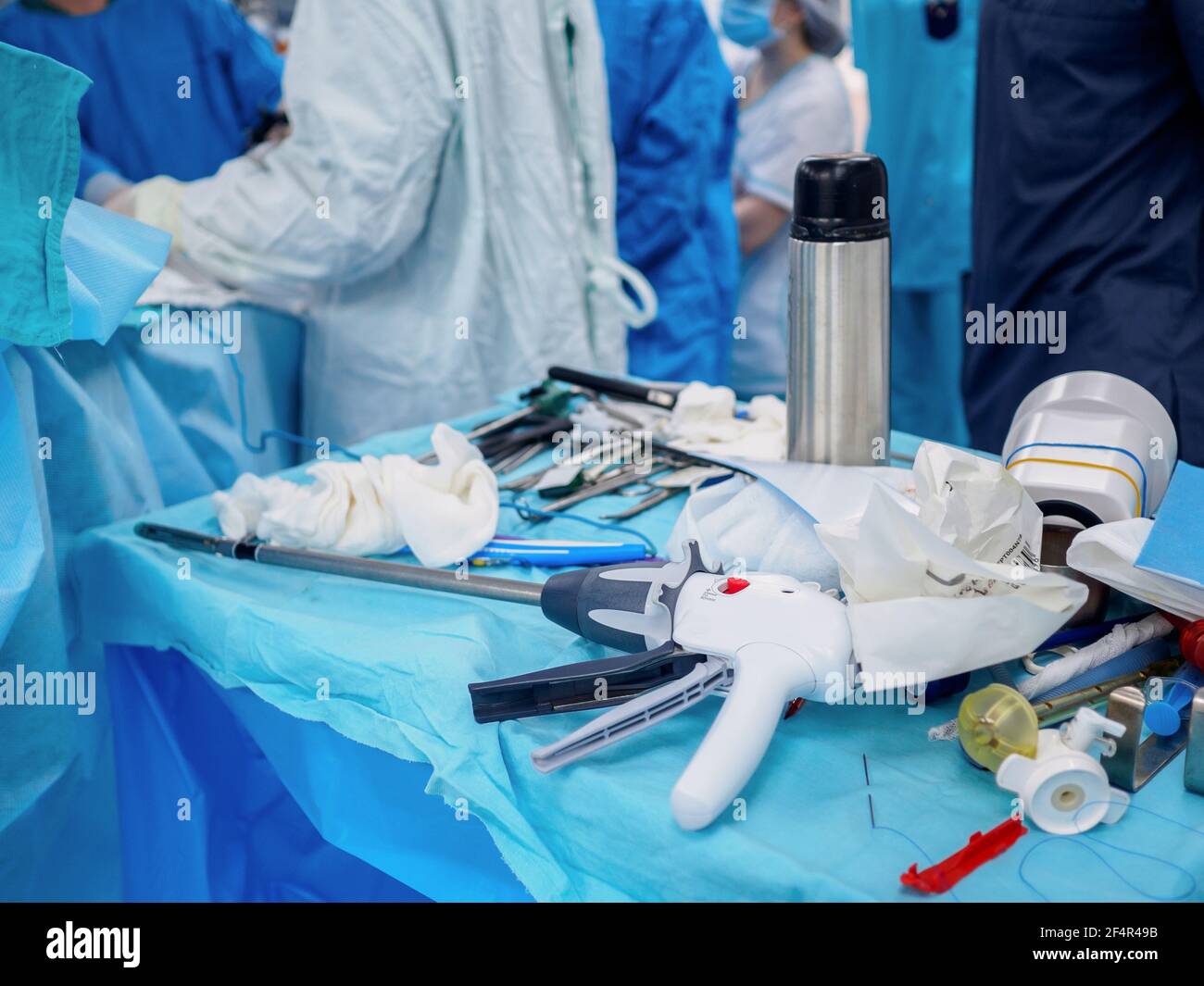 Close-up of various medical instruments with traces of blood on the ...