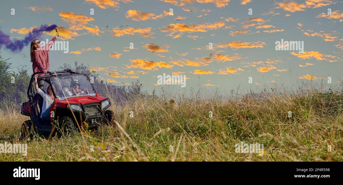 colorful torches while driving a off road buggy car Stock Photo - Alamy