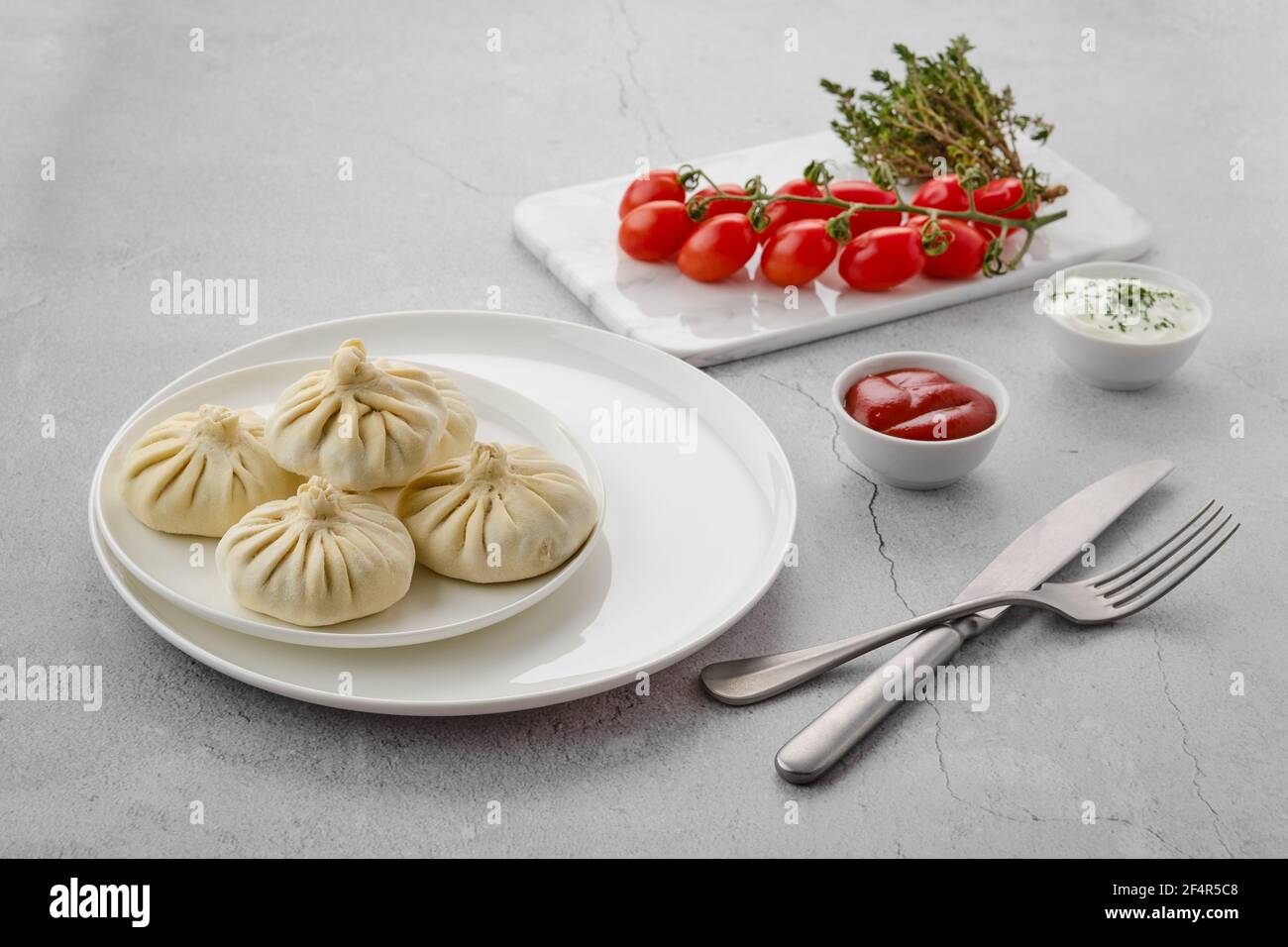Frozen semifinished khinkali stuffed with lamb meat Stock Photo - Alamy