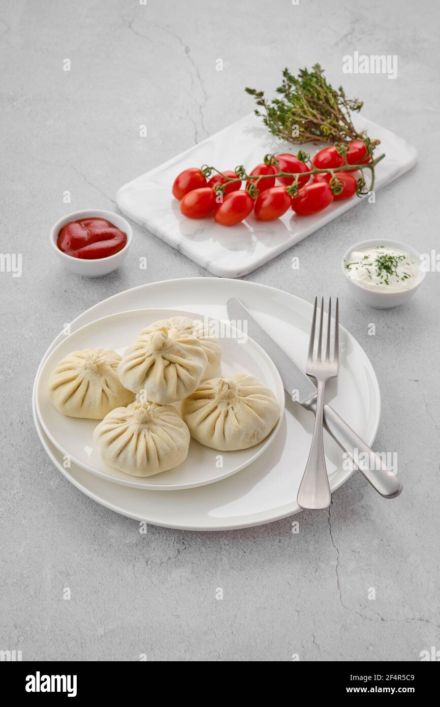 Frozen semifinished khinkali stuffed with lamb meat Stock Photo - Alamy