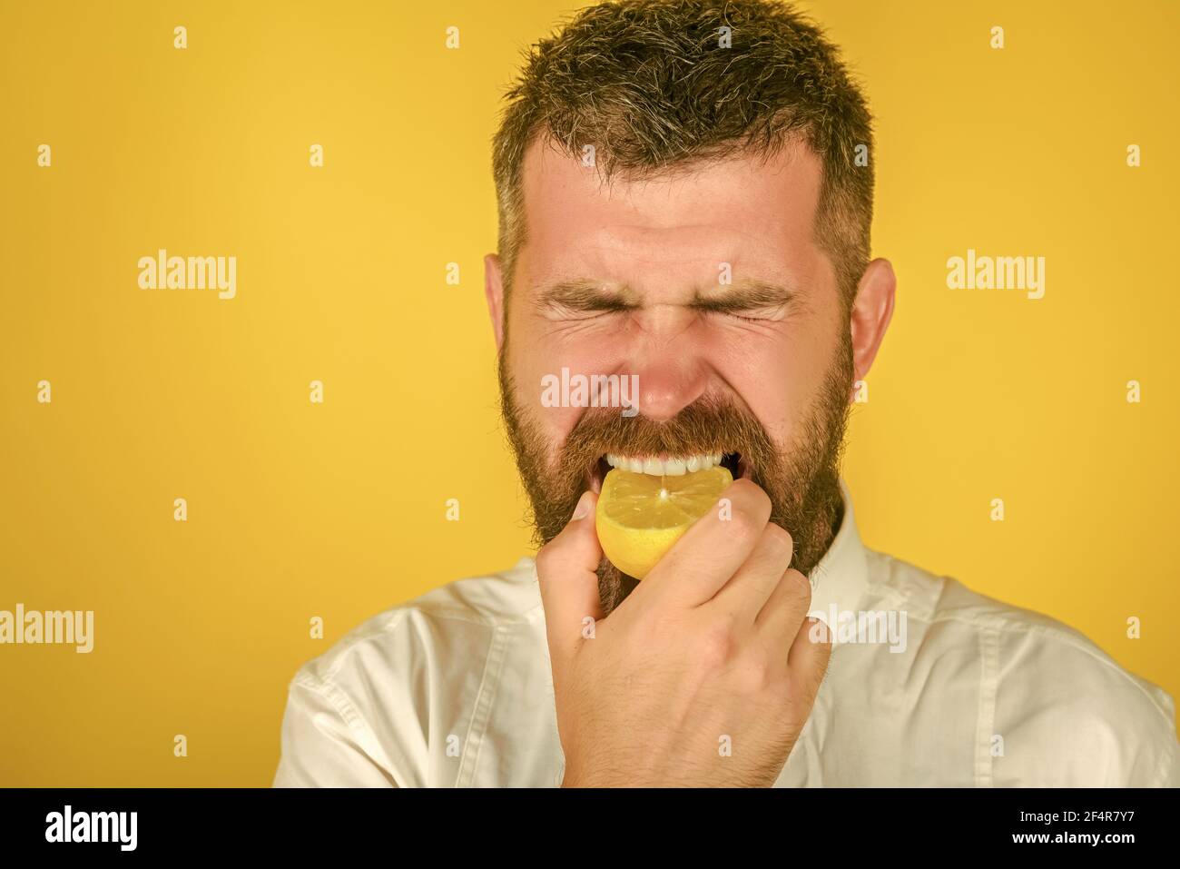 Squeezing a lemon mouth hi-res stock photography and images - Alamy