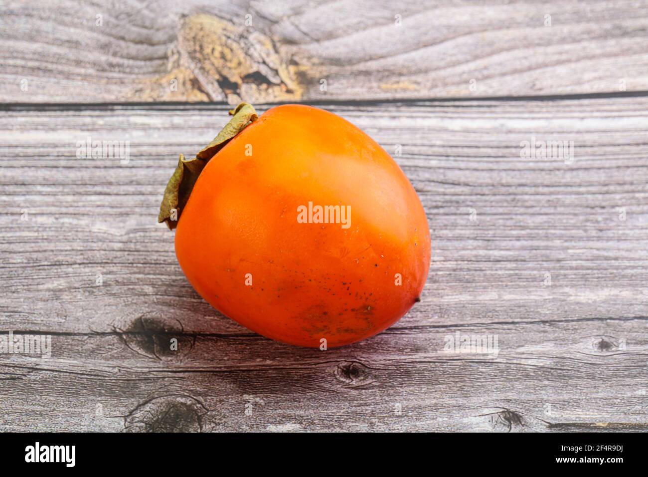 Ripe sweet and tasty persimmon fruit Stock Photo - Alamy