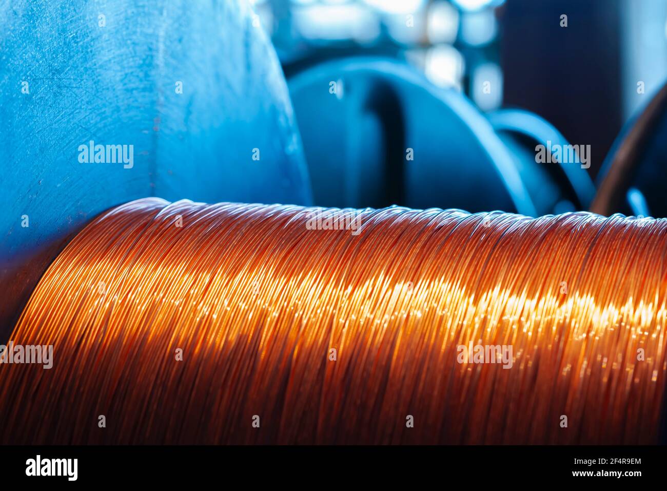 Copper wire reels in cable factory close up Stock Photo - Alamy