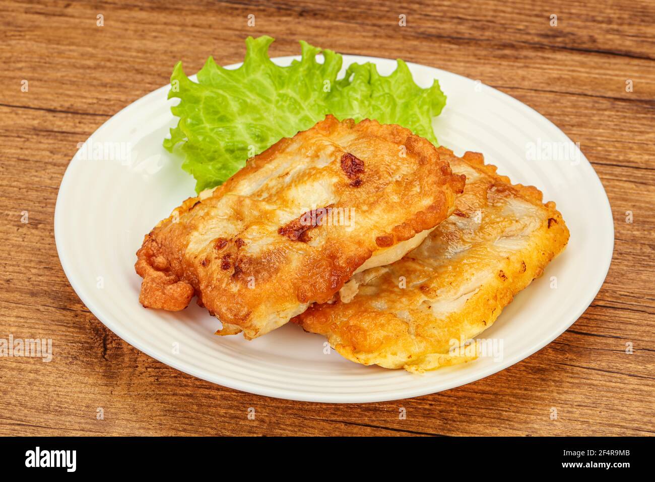 Roasted cod fish in the bread Stock Photo - Alamy
