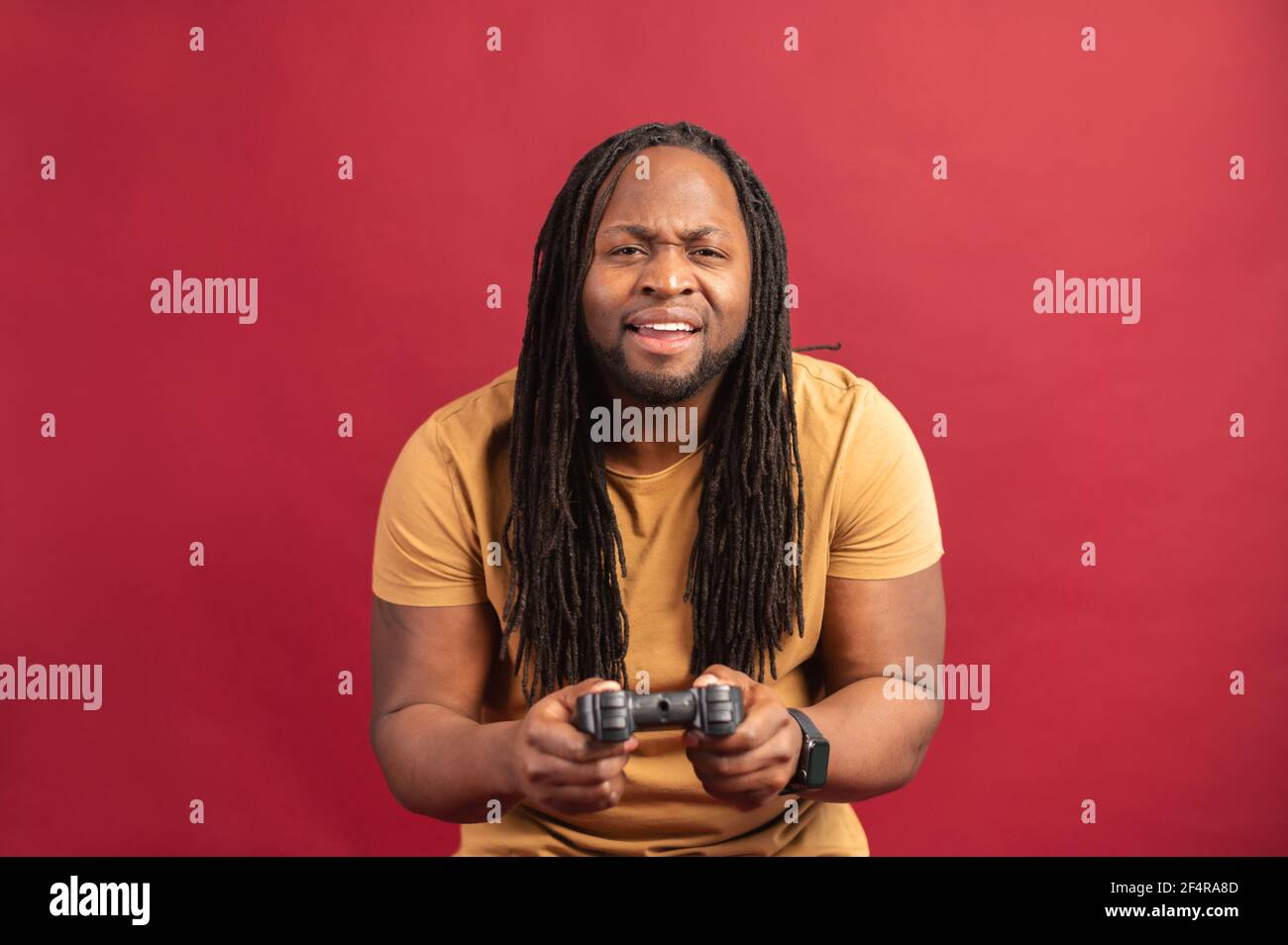 Red game controller over hi-res stock photography and images - Alamy