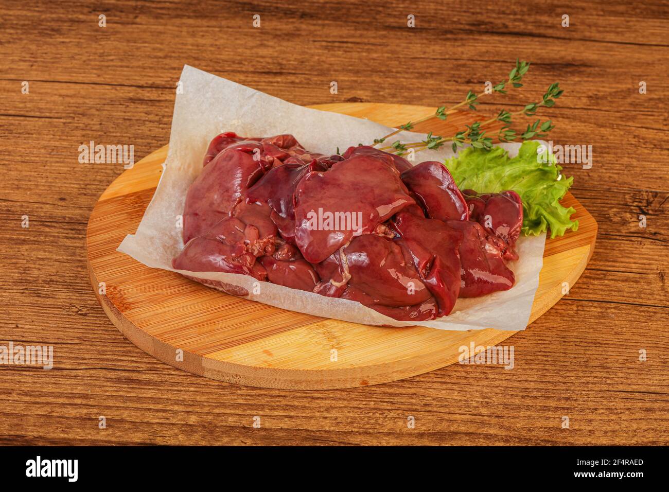 Raw chicken liver over board ready for cooking Stock Photo - Alamy