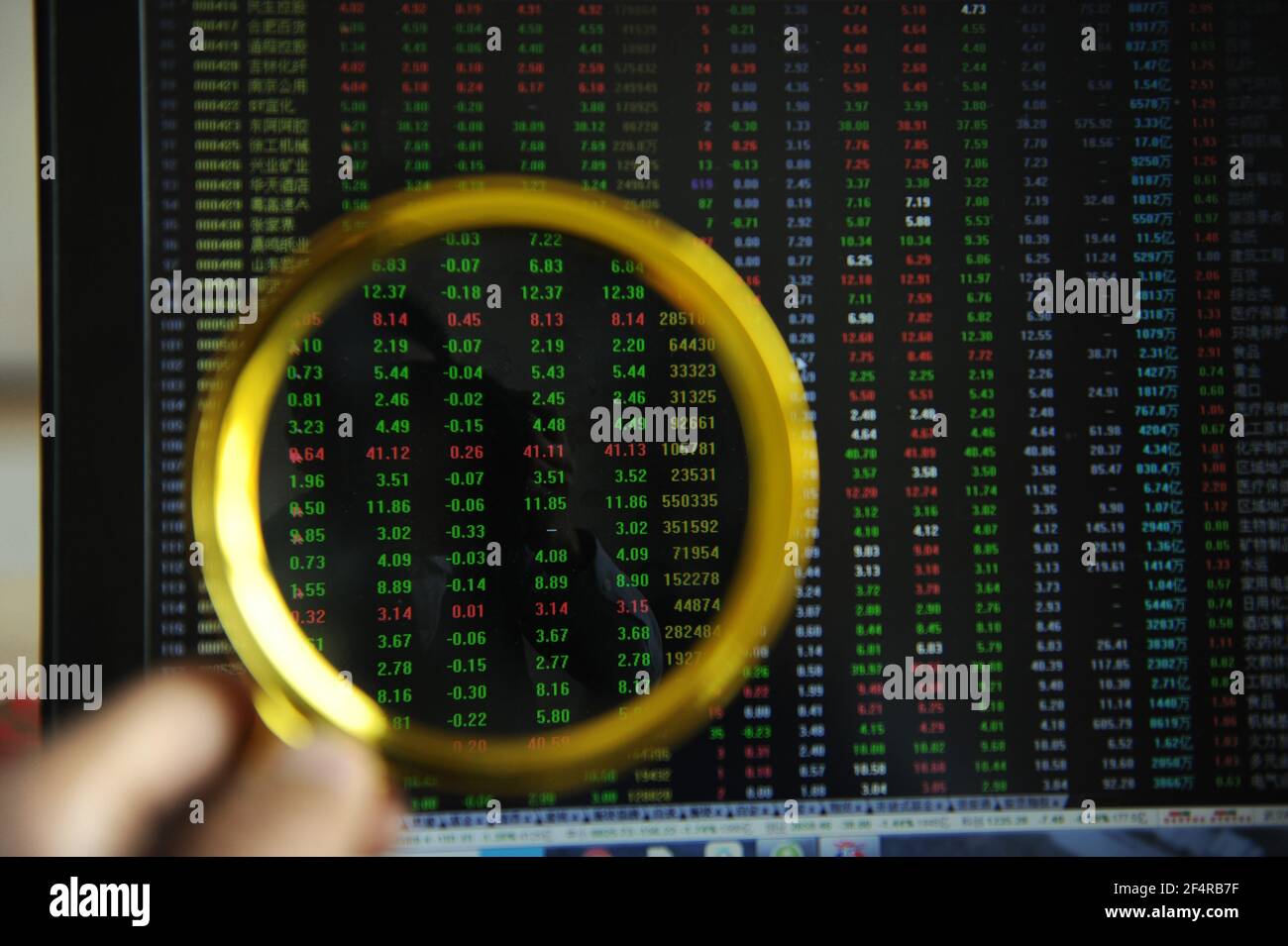 SHIYAN, CHINA - MARCH 23, 2021 - A view of China's stock markets today ...