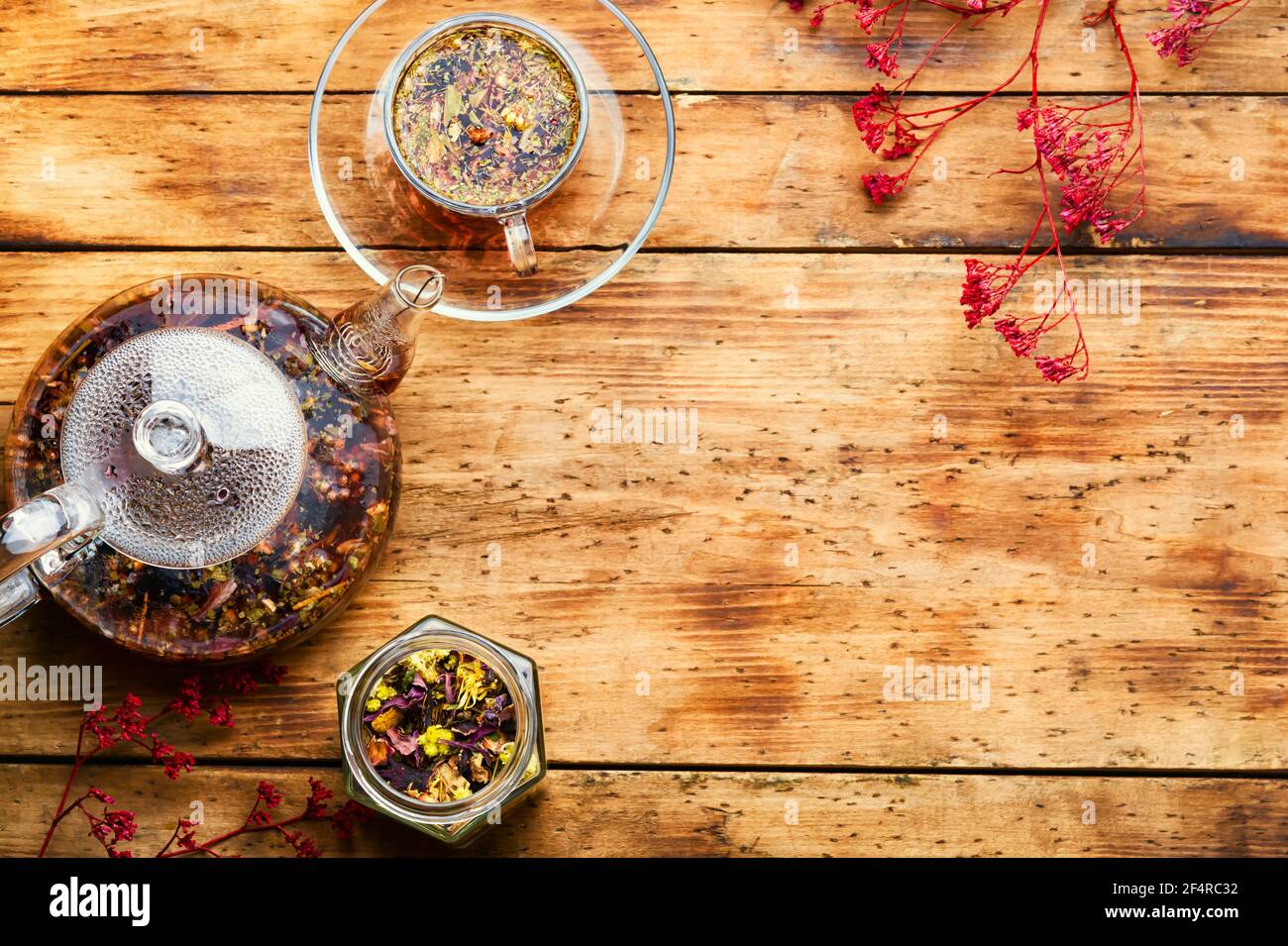 Fragrant flower tea in a glass teapot.Space for text Stock Photo - Alamy