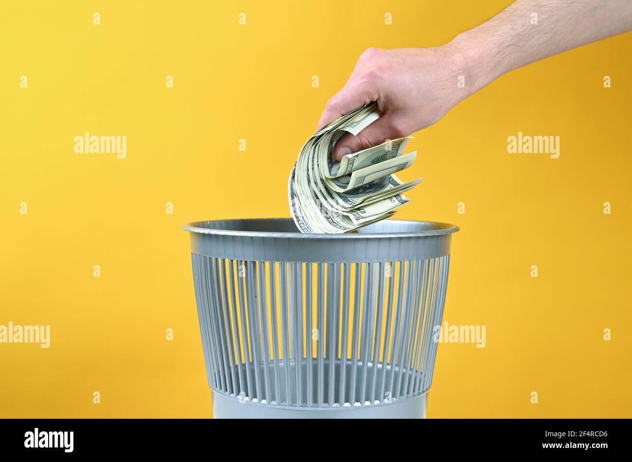 Money thrown away hi-res stock photography and images - Alamy