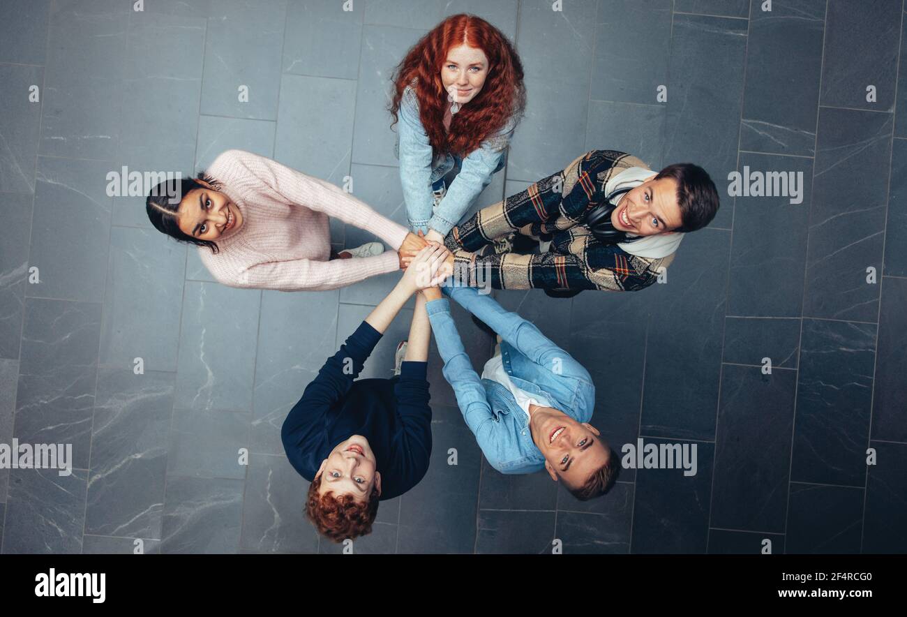 Multi ethnic hands stacked hi-res stock photography and images - Alamy