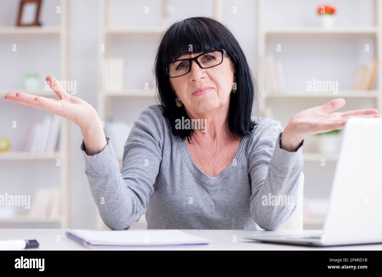 The senior woman struggling at computer Stock Photo - Alamy