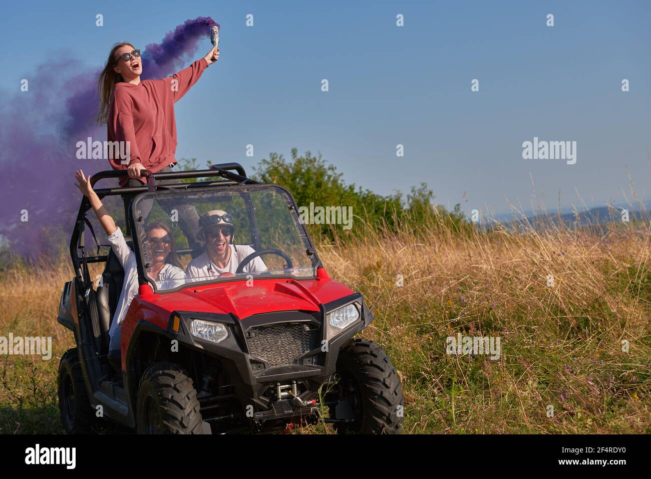 colorful torches while driving a off road buggy car Stock Photo - Alamy