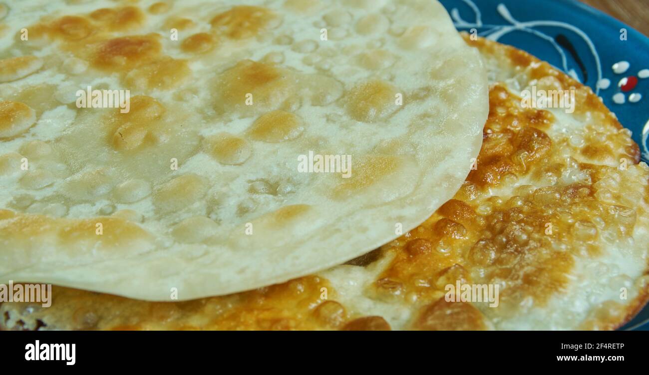 Kitcha fir-fir - Ethiopian flatbread made with wheat flour Stock Photo ...