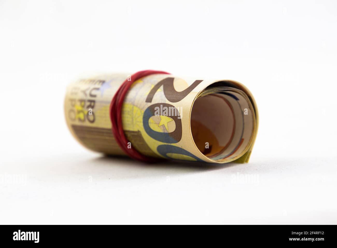 200 euro bank notes rolled up, isolated on white background Stock Photo ...