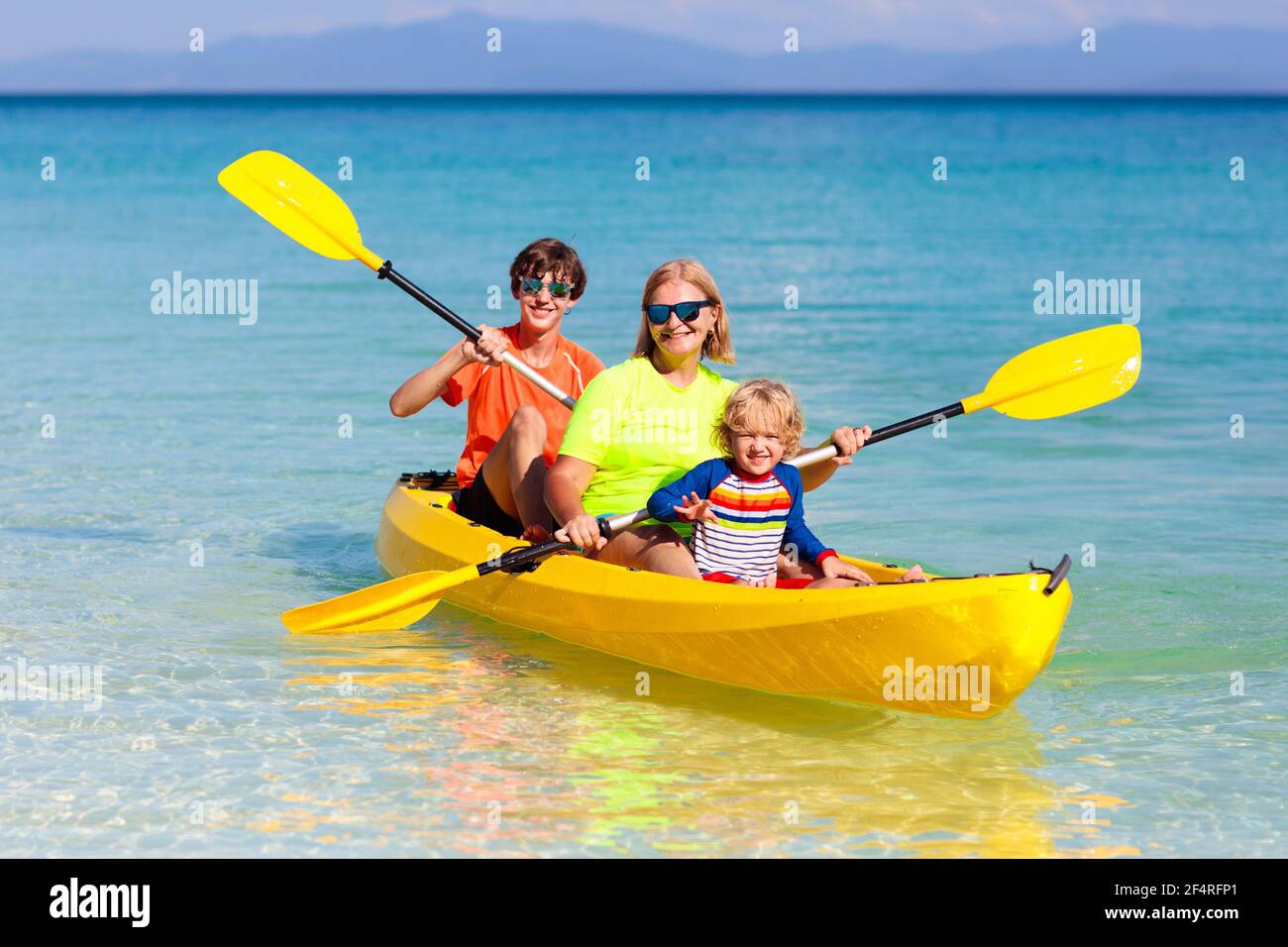 Boy in kayak in the sea hi-res stock photography and images - Alamy