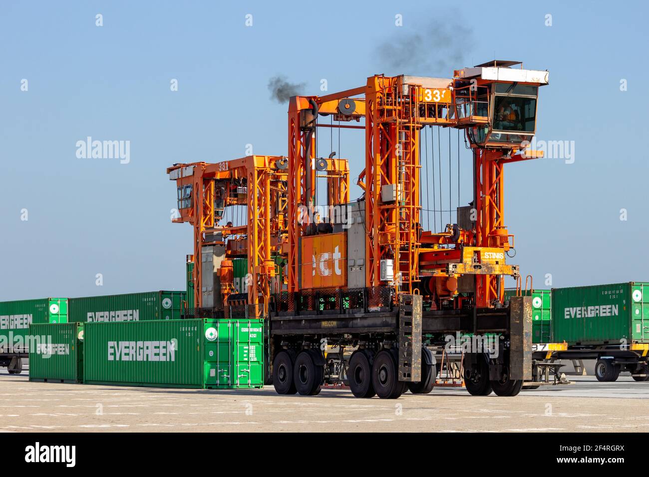 Straddle carrier used for moving containers in a container terminal in ...