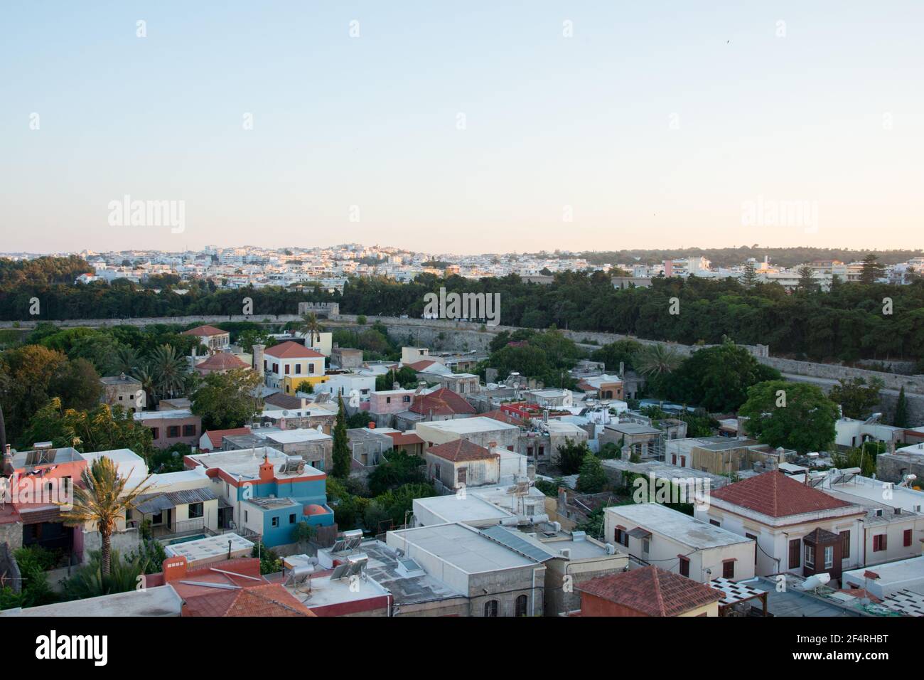 Aerial panoramic view of Rhodes town before sunset. Buildings, ancient ...