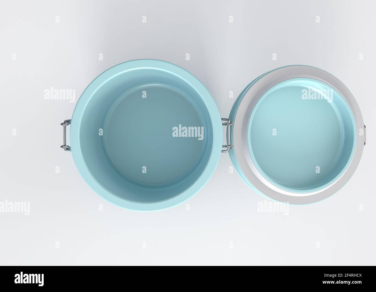 A blue ceramic kitchen storage container with wire closing mechanisms ...