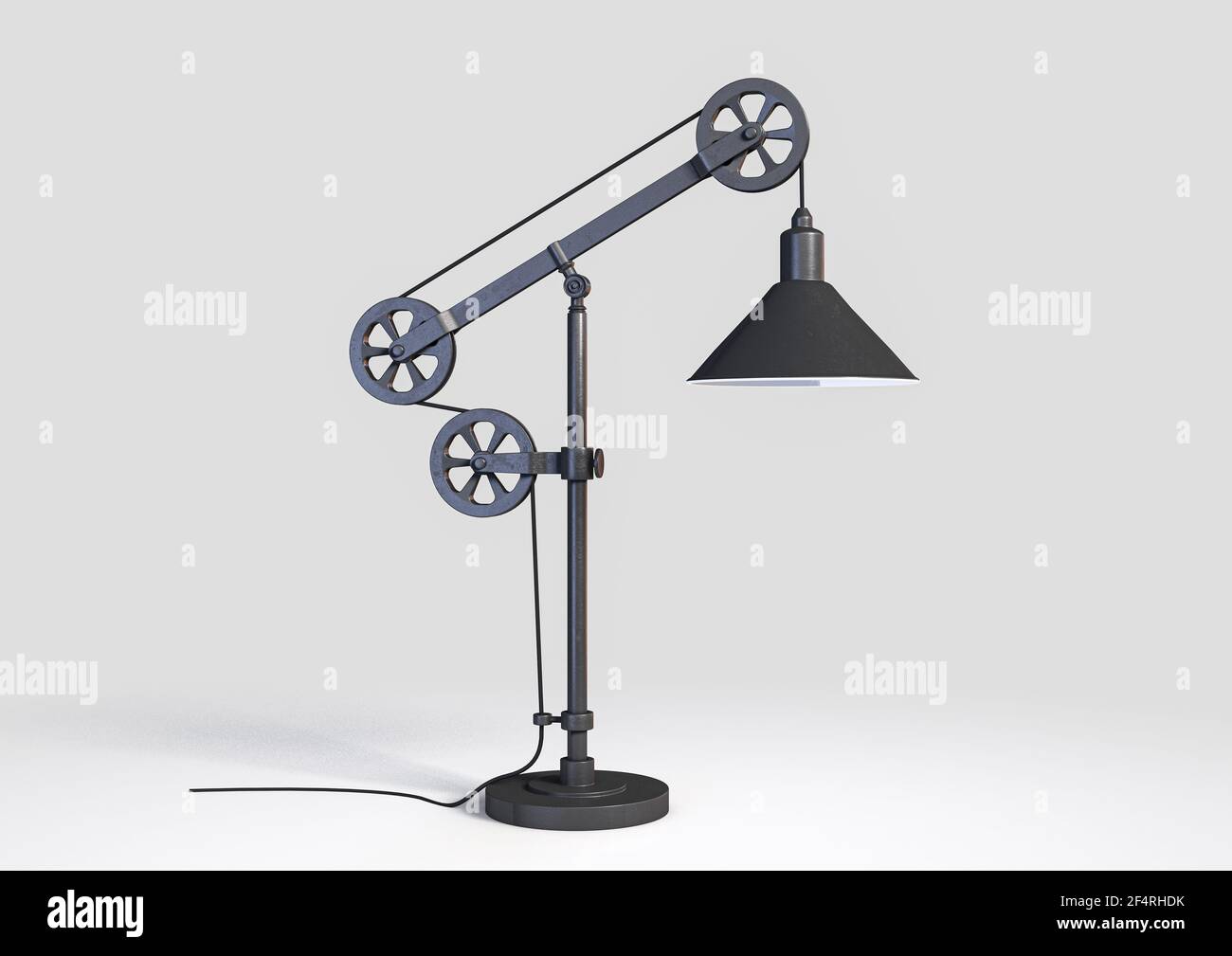 An industrial styled desk lamp on an isolated white studio background ...