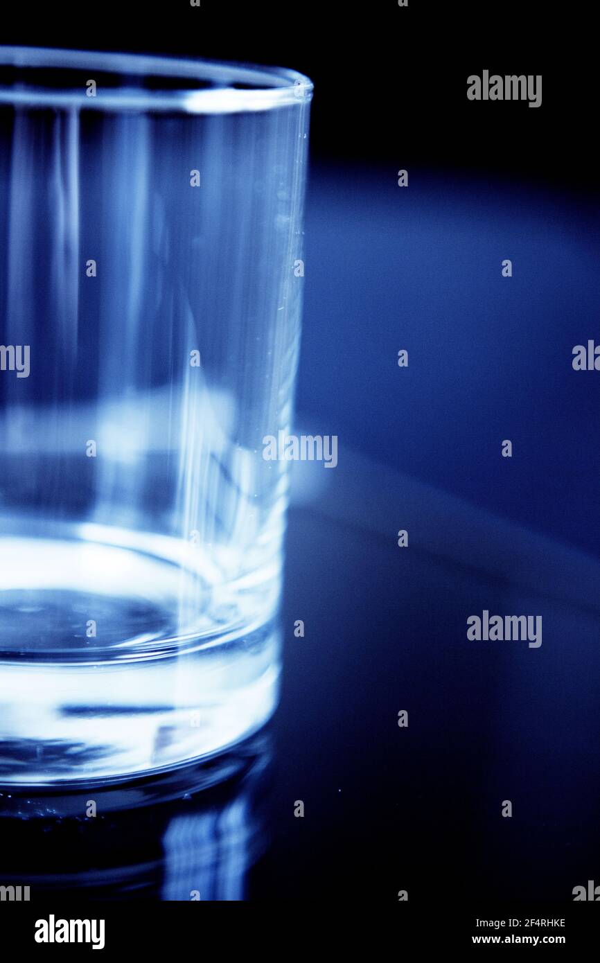 Empty glass transparent glass on dark background. Copy space Stock ...