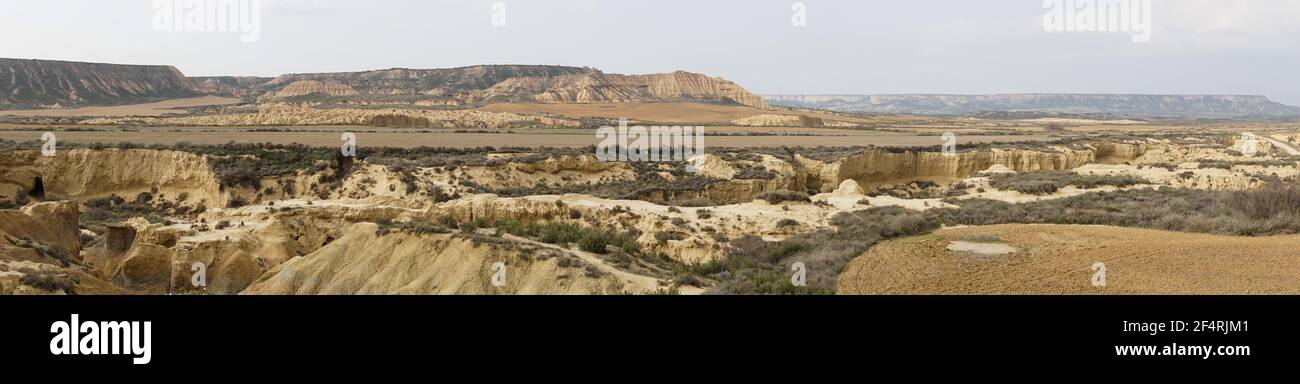 A panorama view of the desert grasslands and mesas and table mountains ...