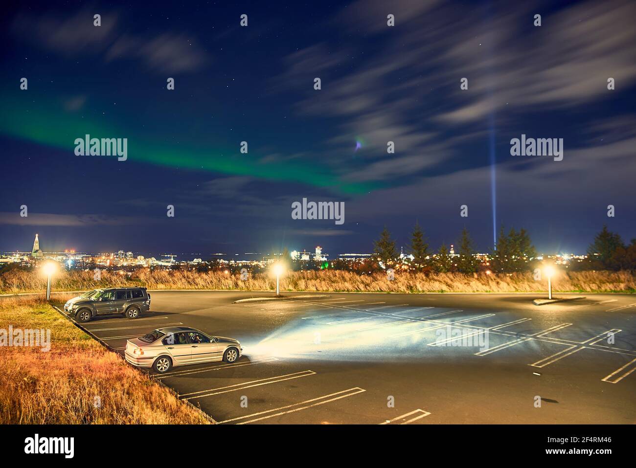 northern lights above Reykjavik in Iceland at night Stock Photo - Alamy