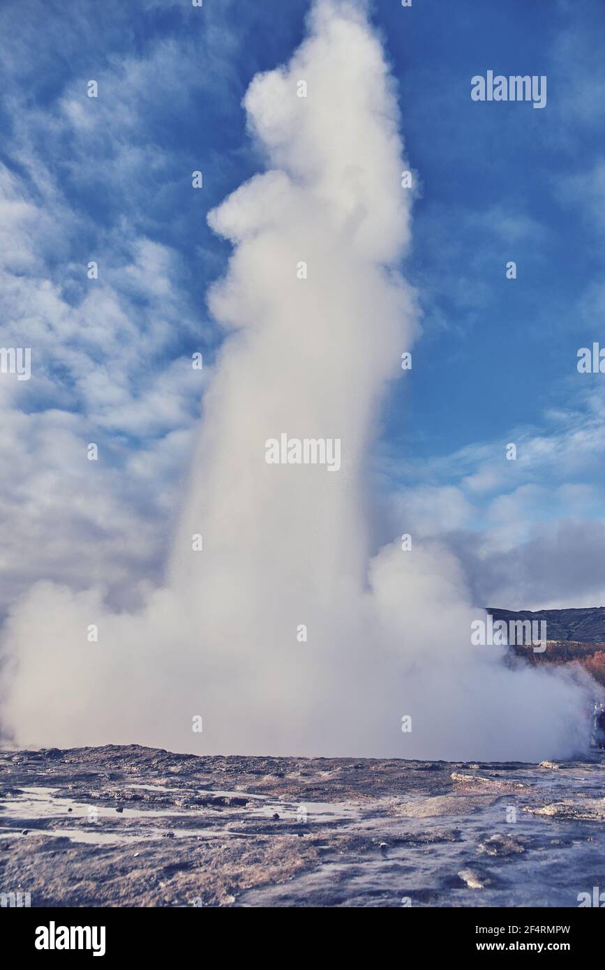 Geyser explosion in the Geysir park, Iceland Stock Photo - Alamy