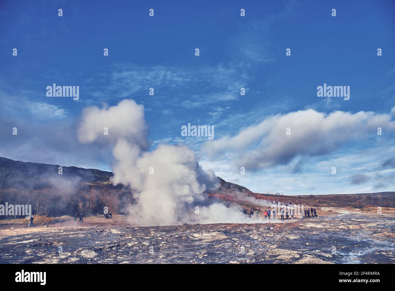 Geyser explosion in the Geysir park, Iceland Stock Photo - Alamy