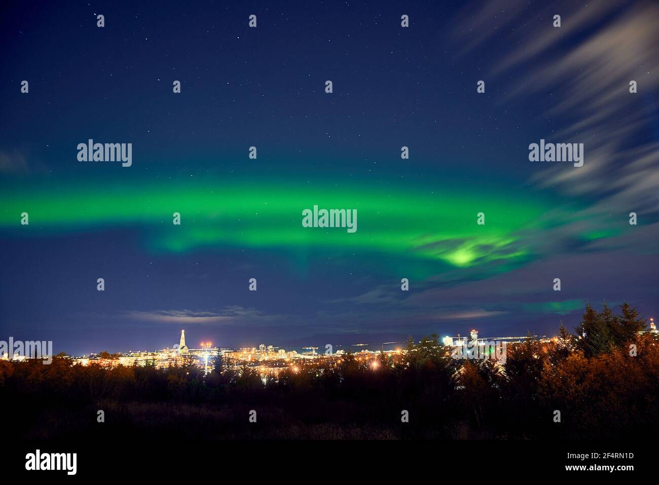 northern lights above Reykjavik in Iceland at night Stock Photo - Alamy