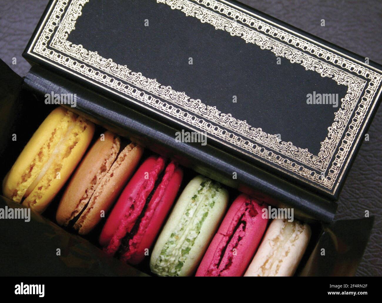 French macarons biscuits of different colors made with egg, almond ...