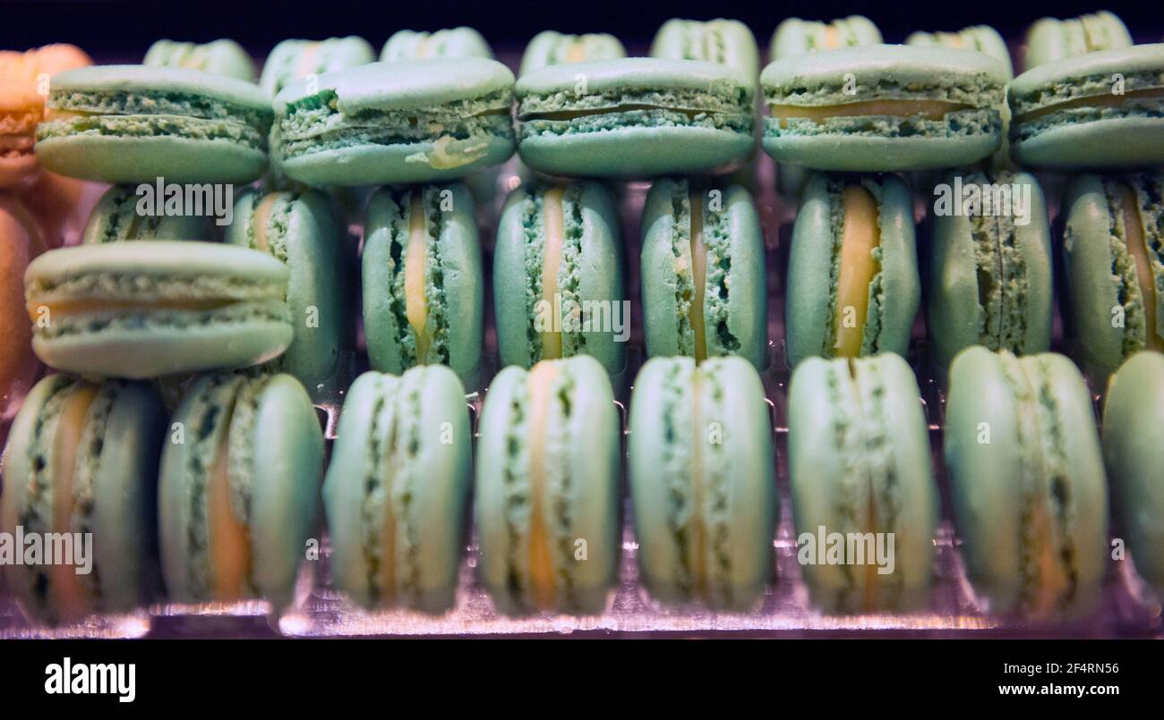 French macarons biscuits of different colors made with egg, almond ...