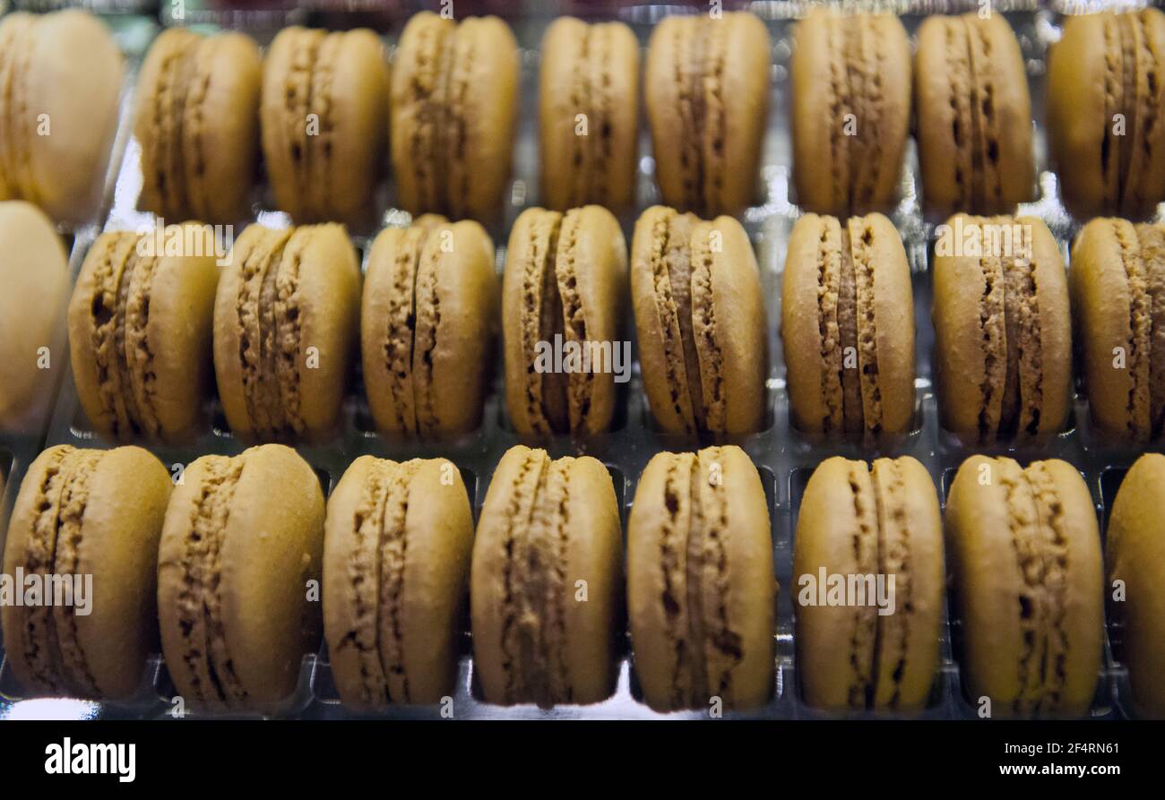 French macarons biscuits of different colors made with egg, almond ...