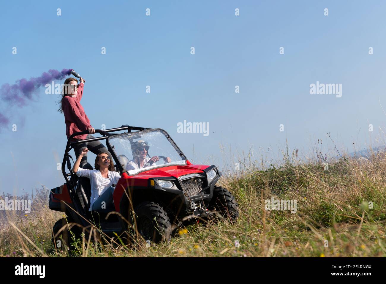 colorful torches while driving a off road buggy car Stock Photo - Alamy