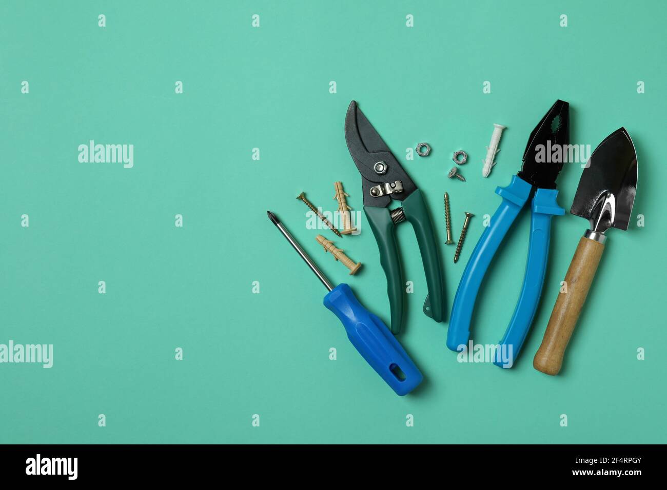 Different housework tools on mint background, space for text Stock ...