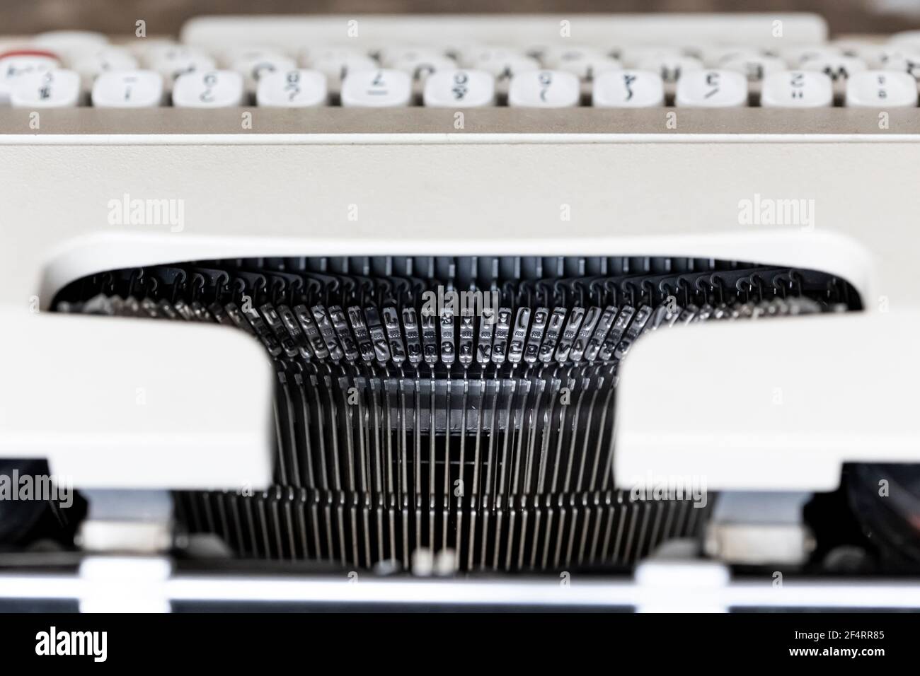 Photograph of a typewriter from above, with the focus on the metal ...