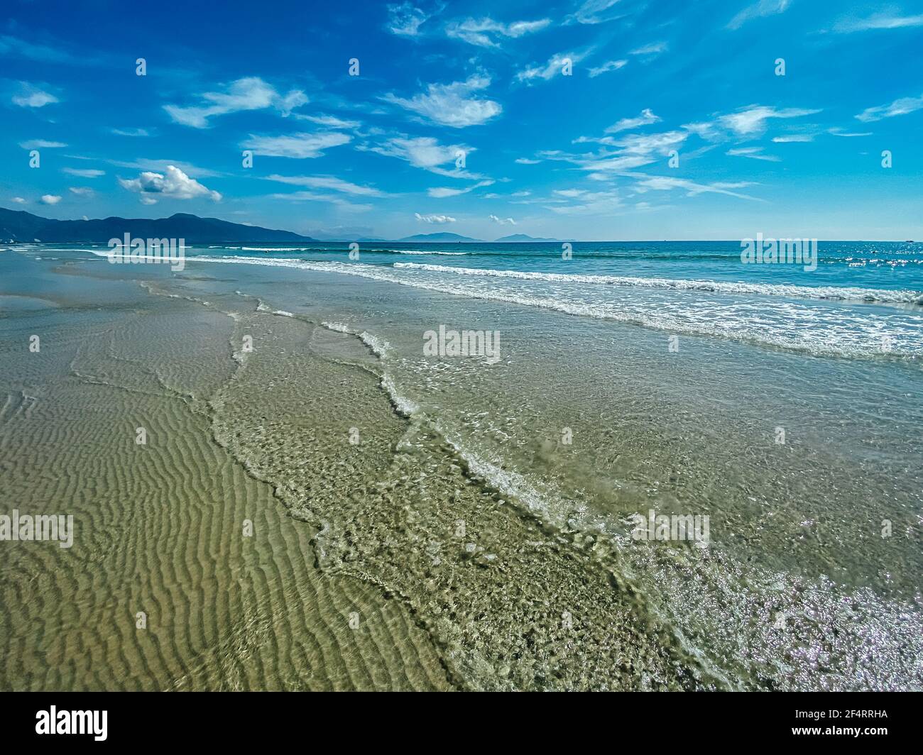 Tropical vacation concept. Soft long waves on the tropical shore of a ...