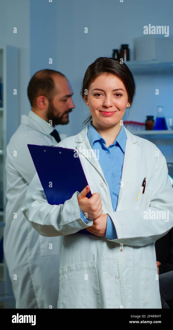 Portrait of scientist neurologist researcher looking at camera smiling ...