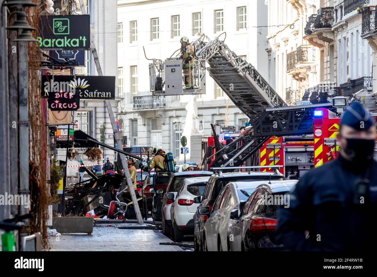 Fire fighters and rescue workers pictured at a fire in the center of ...