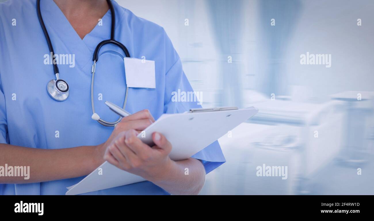 Mid Section Of Female Health Worker Writing On Clipboard At Hospital Stock Photo Alamy mid-section-of-female-health-worker-writing-on-clipboard-at-hospital-stock-photo-alamy