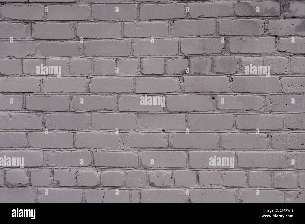 Old brick wall, painted gray. The view from the street Stock Photo - Alamy