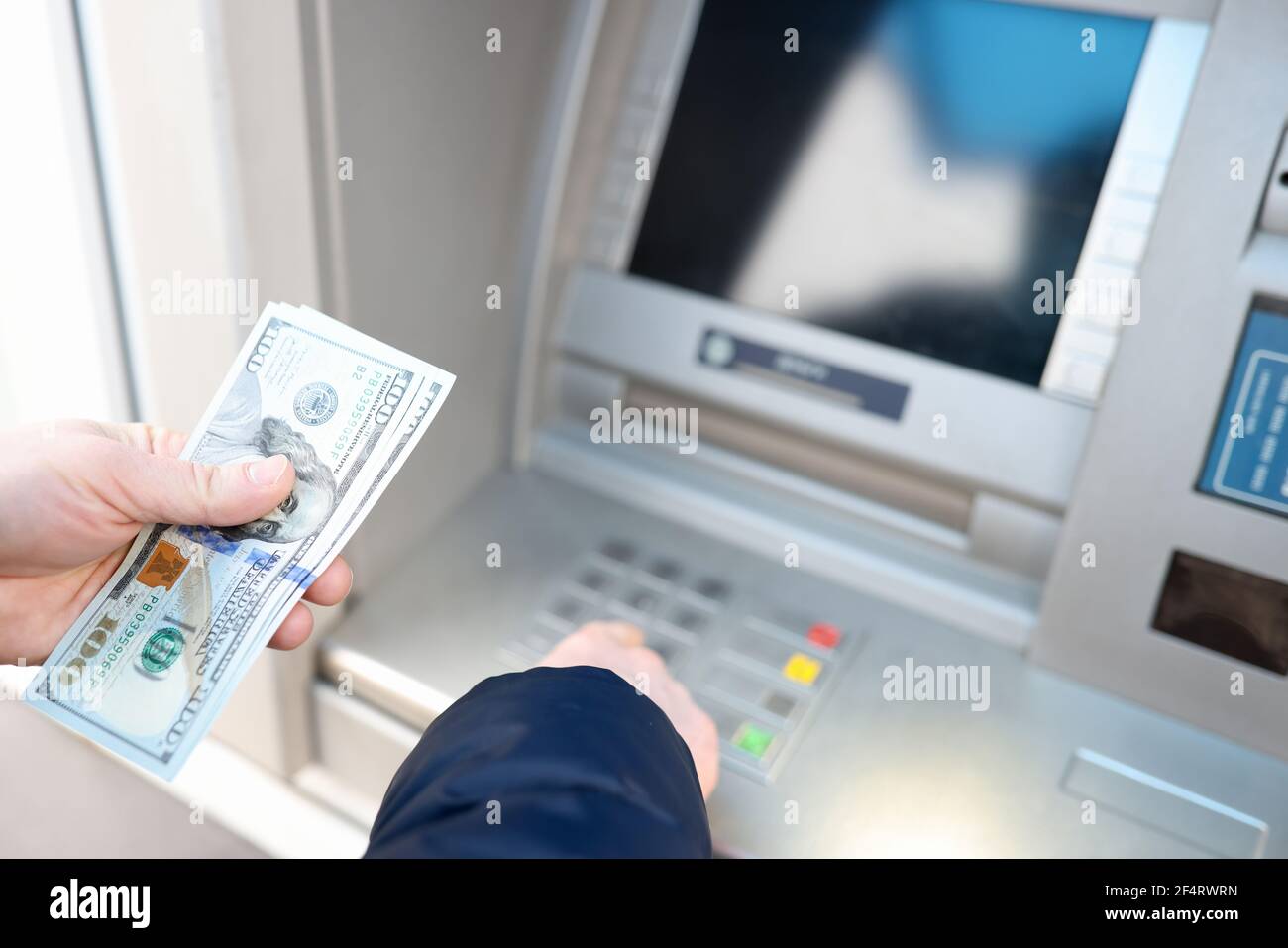 Male withdrawing cash at atm hi-res stock photography and images - Alamy
