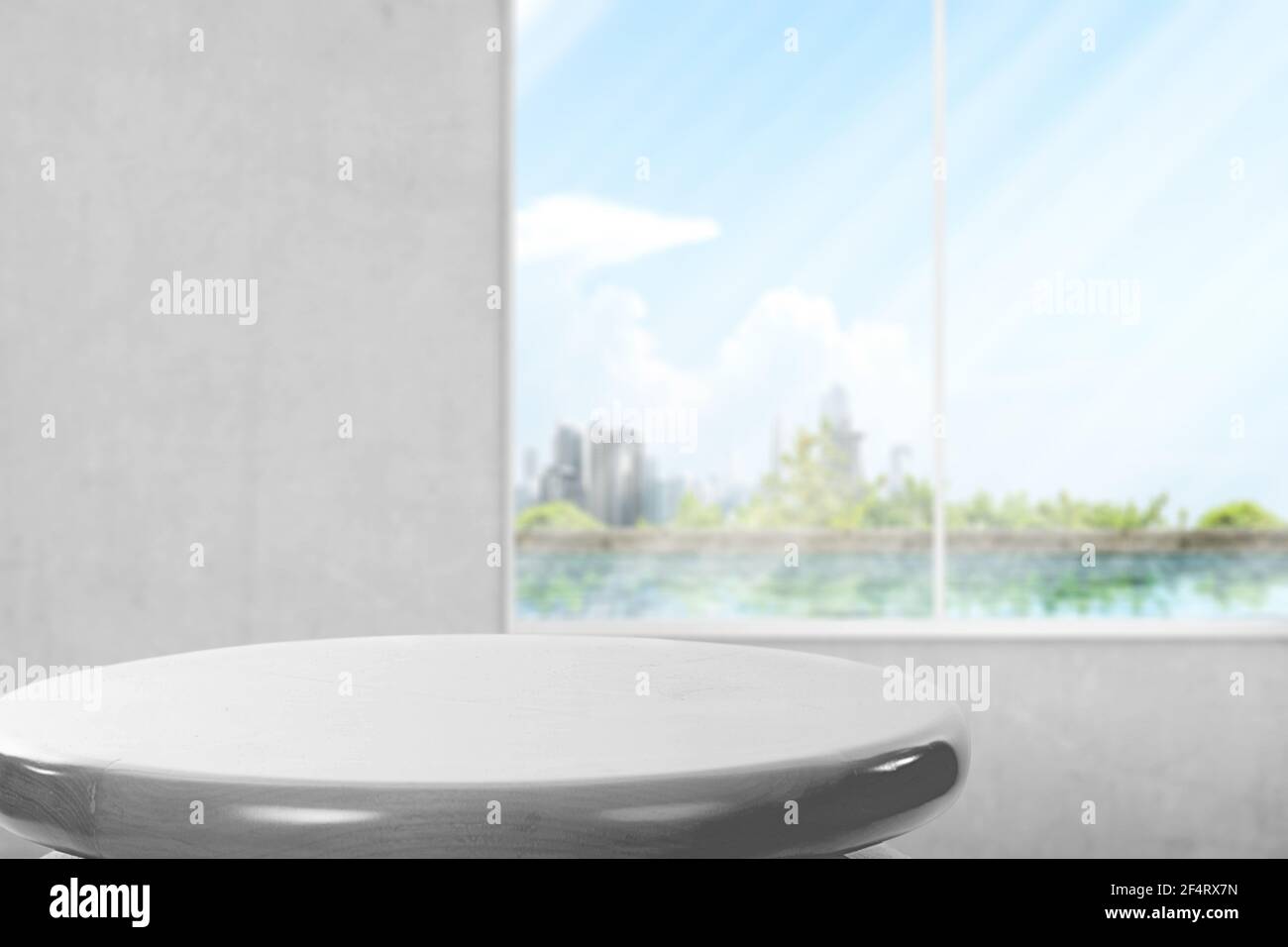 Table and window glass with pond view and skyscrapers background Stock ...