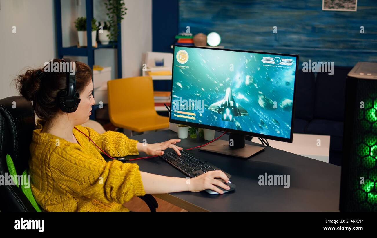 Professional eSport gamer playing in competitive video games on cyber ...