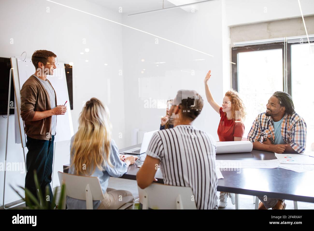 Happy creative team in office. Business, startup, design, people and ...